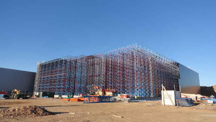 Rack clad storage systems, a self supported warehouse